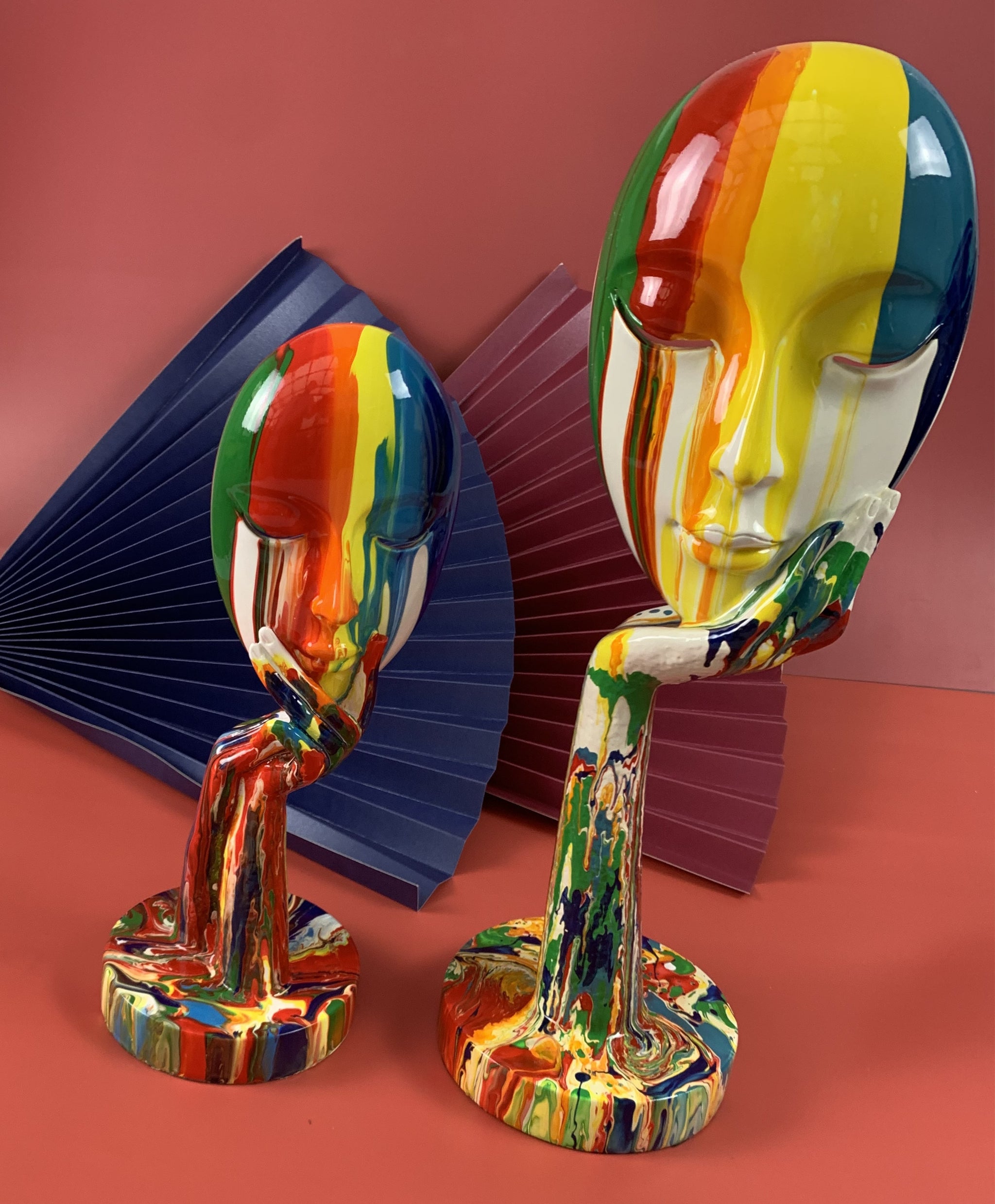 Creative Painted Colorful Woman Face Statues – The Top To Bottom