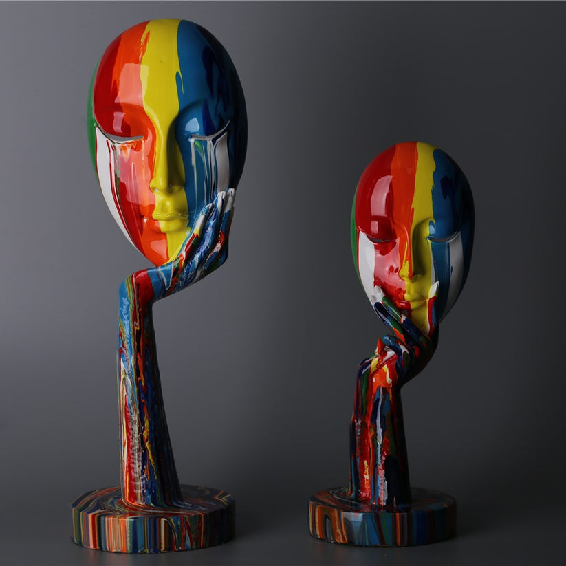 Creative Painted Colorful Woman Face Statues – The Top To Bottom